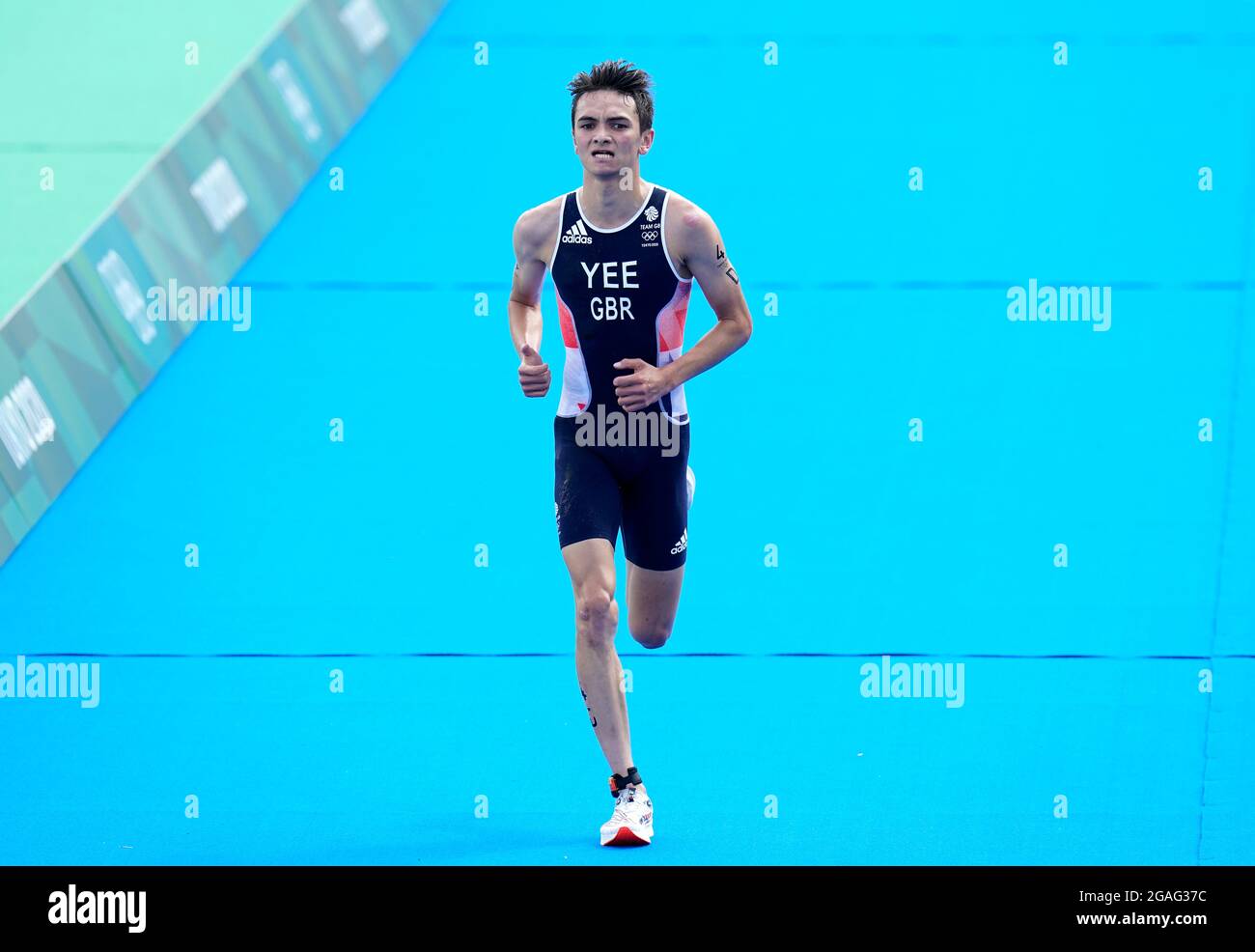Great Britain's Alex Yee crosses the finish line in the Triathlon Mixed ...
