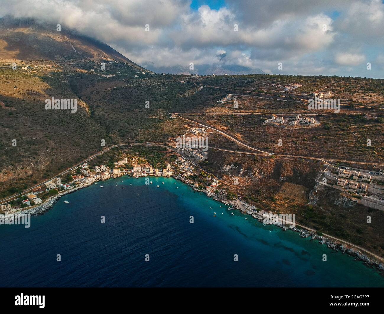 Iconic aerial view over the picturesque seaside Limeni village in Mani ...