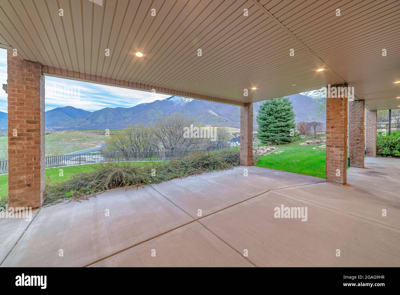 Concrete view deck with red bricks pillars and ceiling Stock Photo - Alamy
