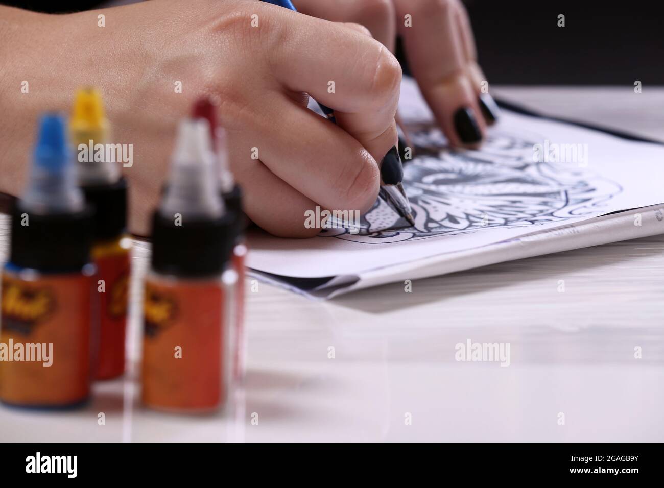 Process of making a sketch for tattoo close-up Stock Photo - Alamy