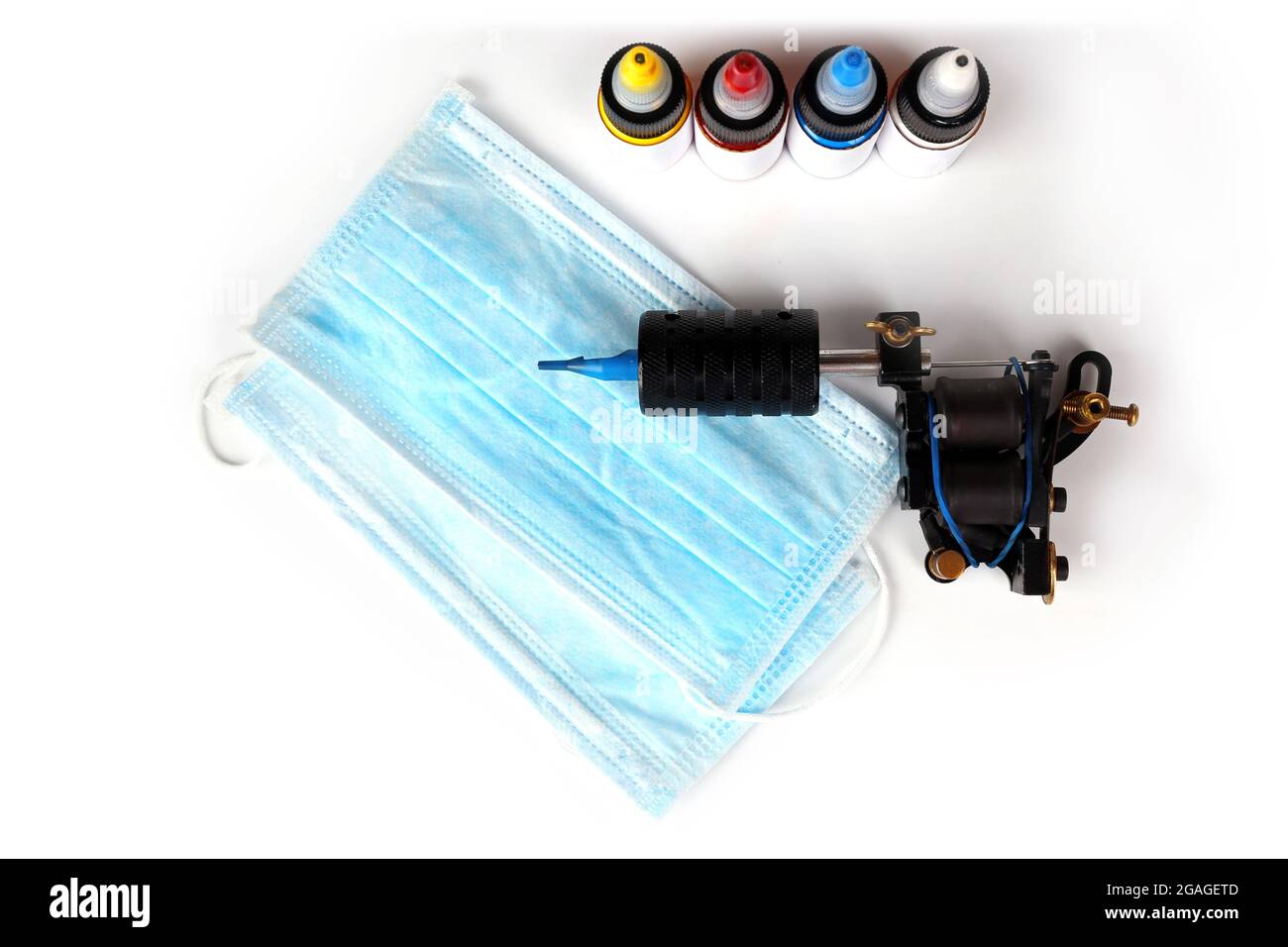 Tattoo machine with colourful ink isolated on white background Stock ...