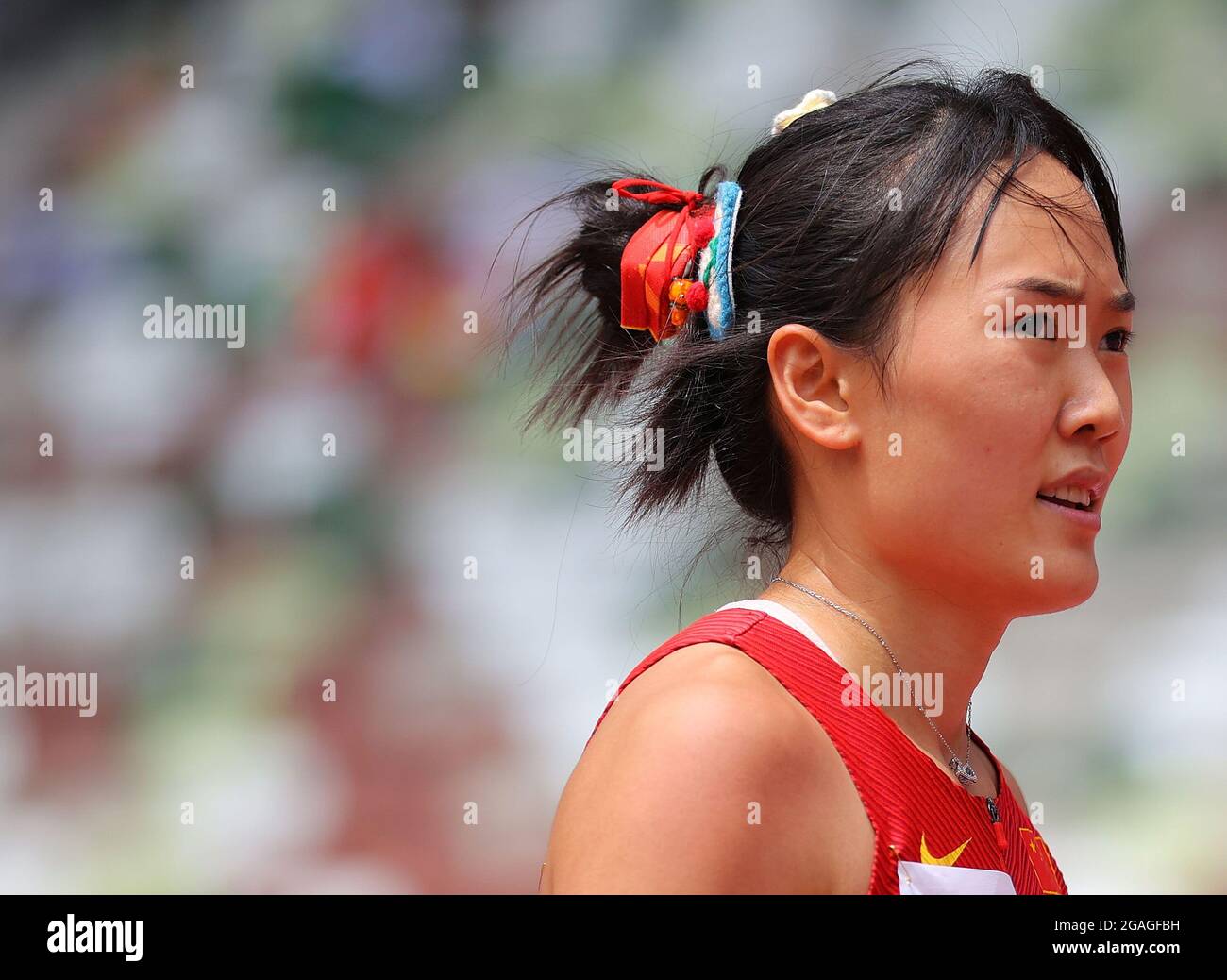Tokyo, Japan. 31st July, 2021. Chen Jiamin of China reacts during the women's 100m hurdles heats ...