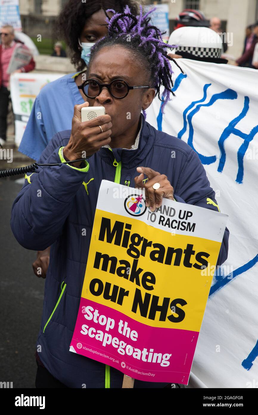 London, UK. 30th July, 2021. A speaker from Stand Up To Racism ...