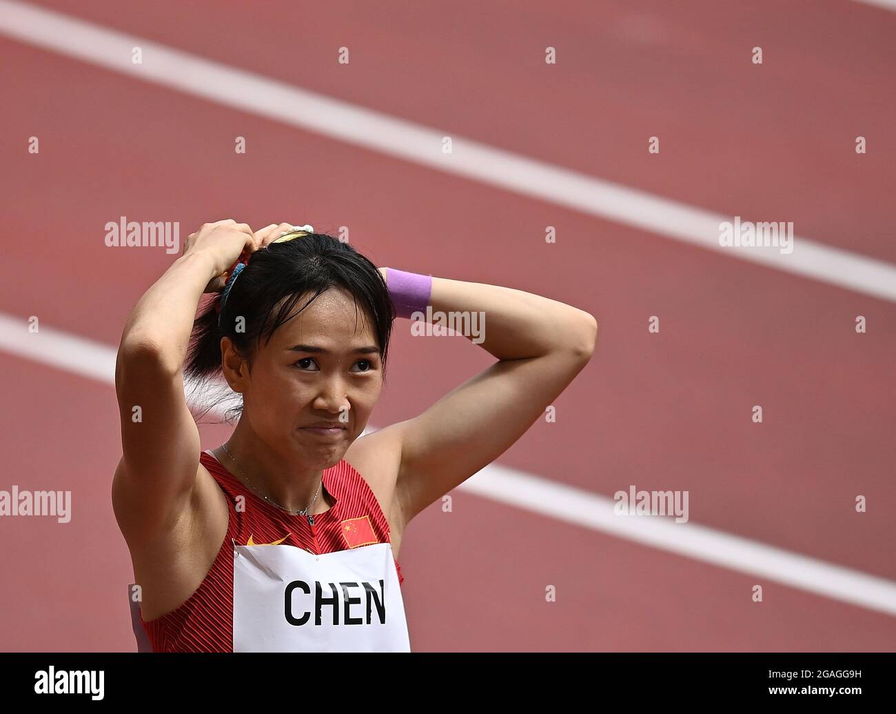 Tokyo, Japan. 31st July, 2021. Chen Jiamin of China reacts after the ...