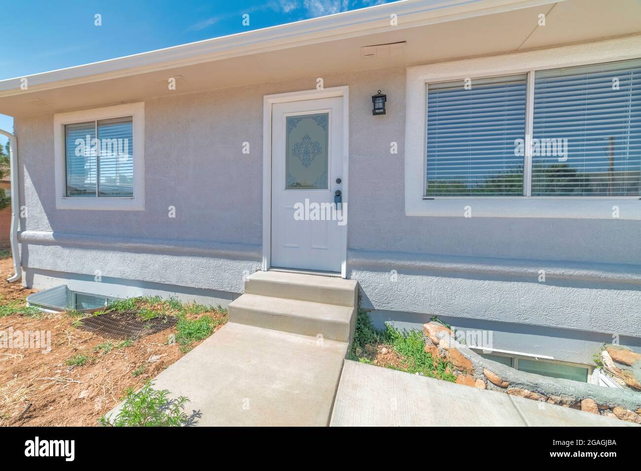 Exterior of a house with light gray and white tones Stock Photo - Alamy