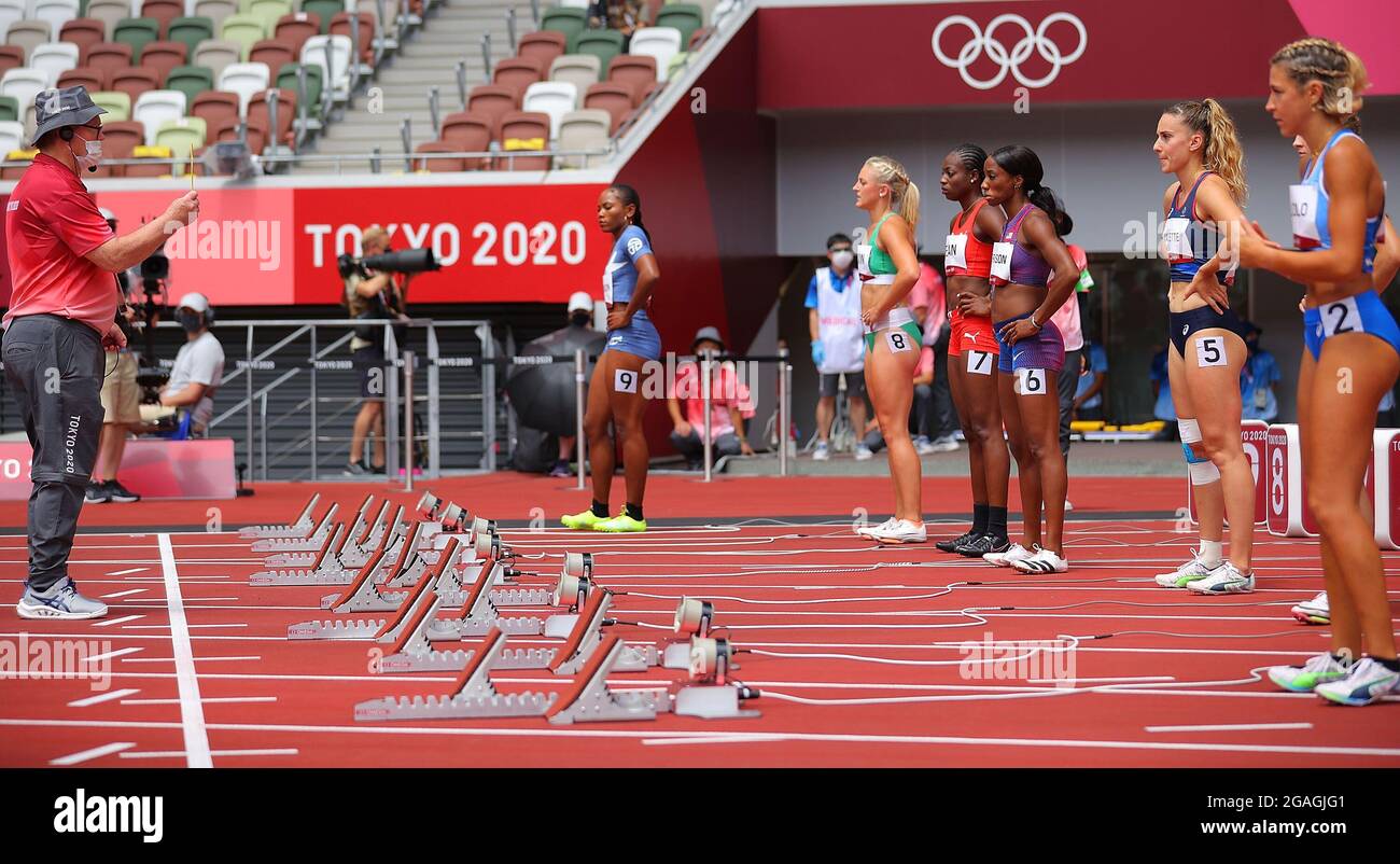Tokyo, Japan. 31st July, 2021. Laura Valette of France (2nd R) receives ...