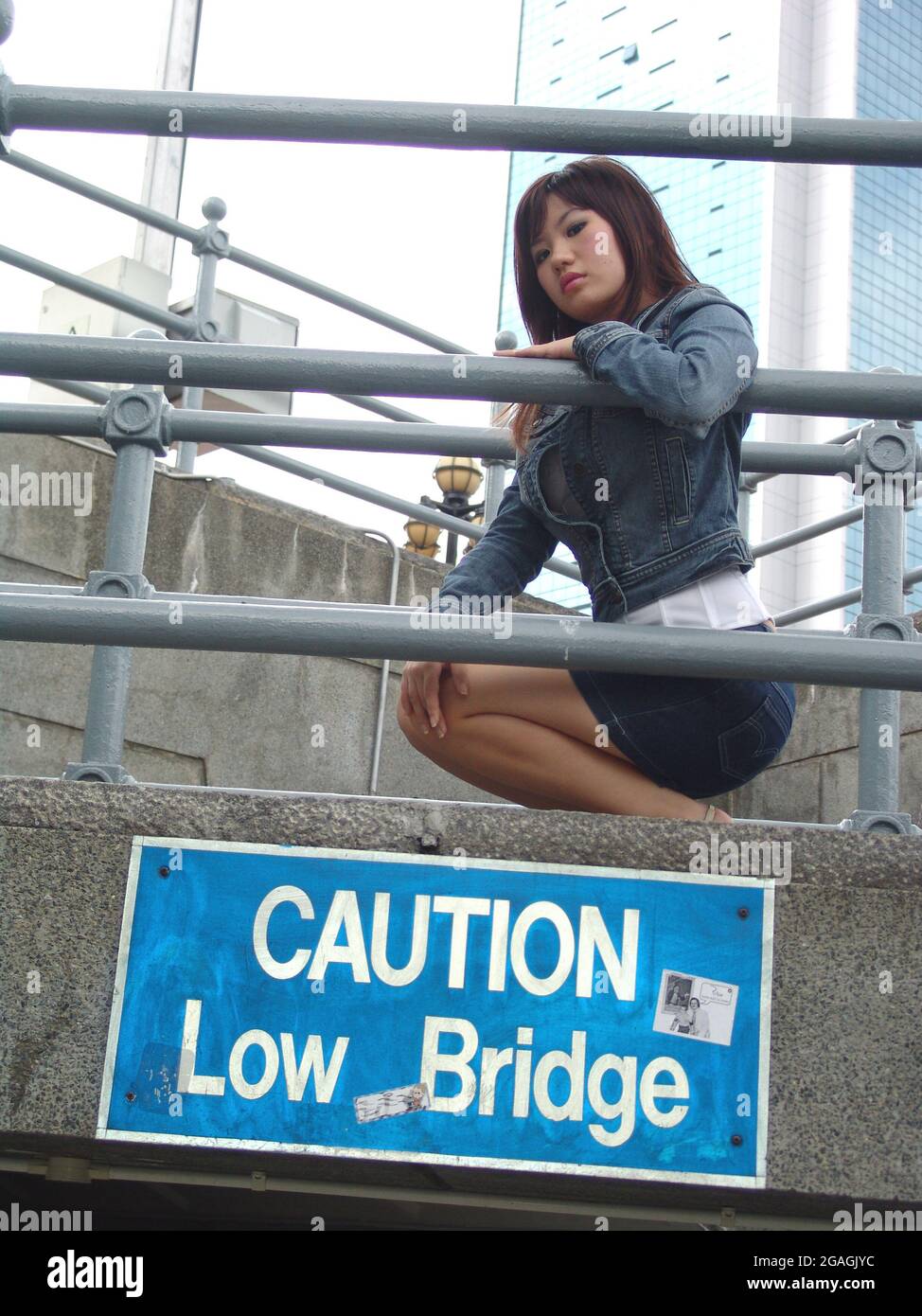 Model on Bridge in Singapore Stock Photo - Alamy