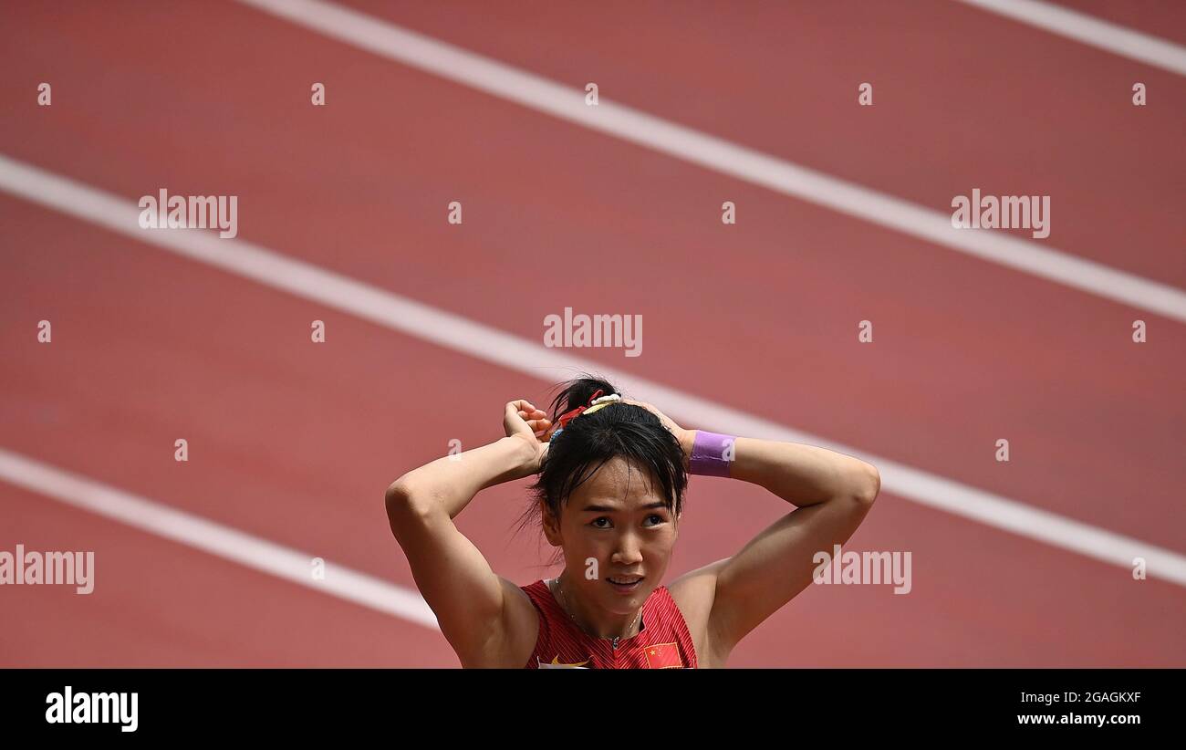 Tokyo, Japan. 31st July, 2021. Chen Jiamin of China reacts during the women's 100m hurdles heats ...