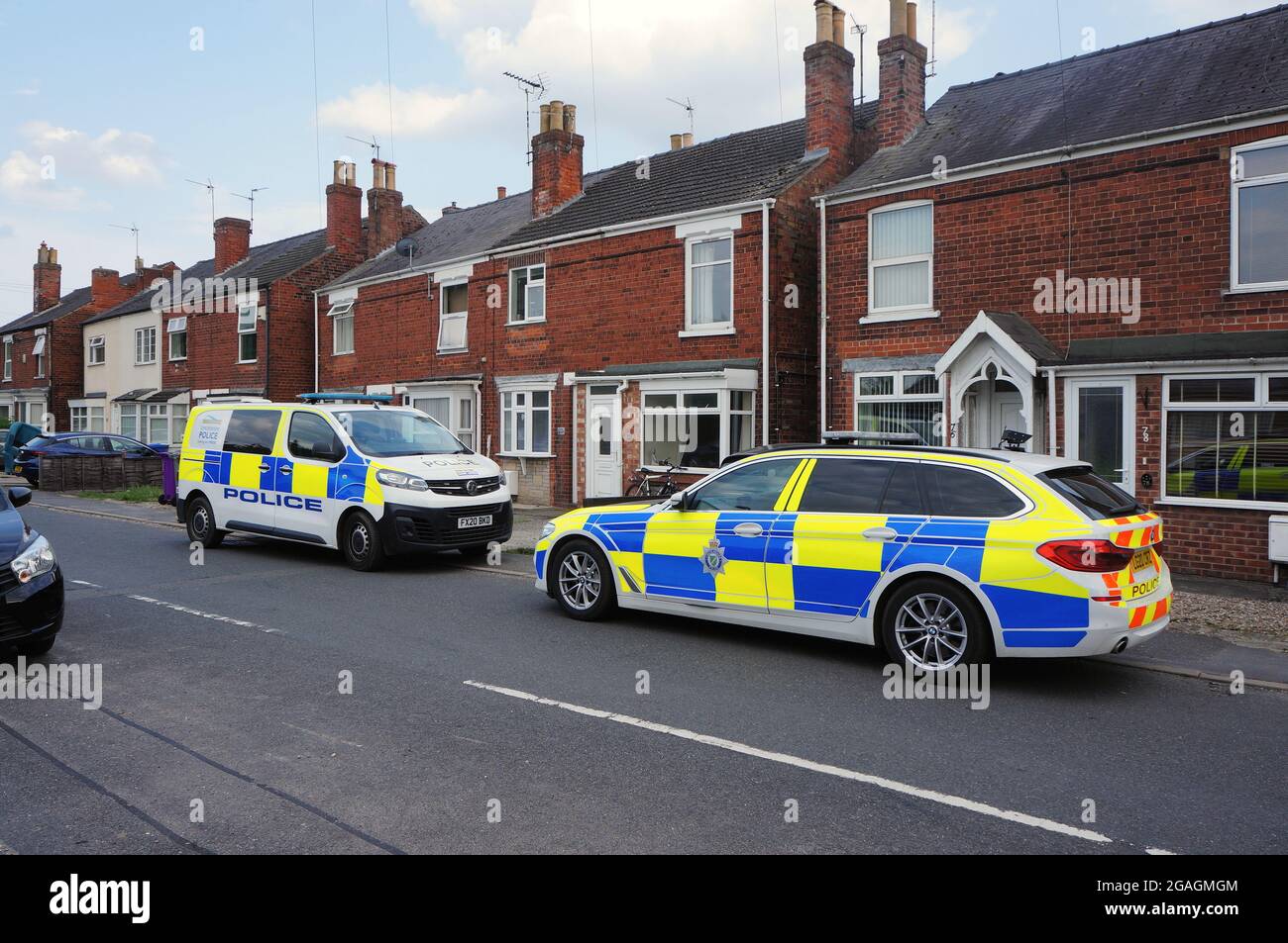 Blue and yellow police car hi-res stock photography and images - Alamy
