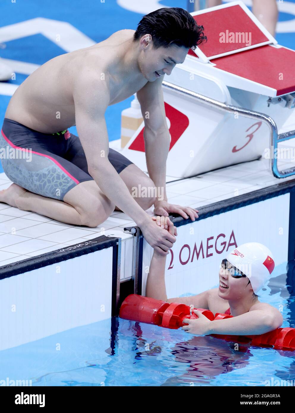 Tokyo, Japan. 31st July, 2021. Yang Junxuan (R) and Xu Jiayu of China celebrate after the mixed ...