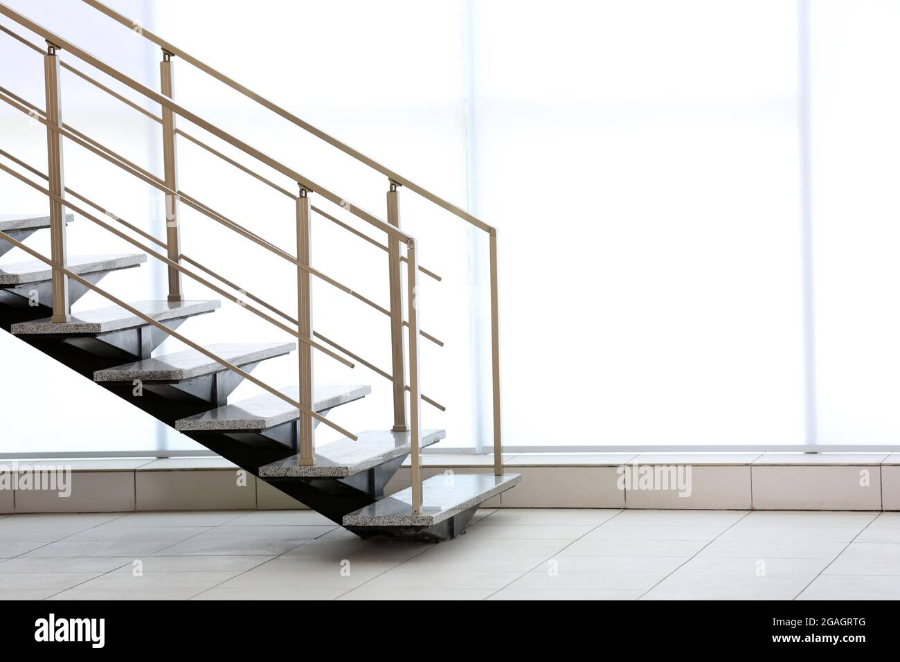 Stairs on big window background Stock Photo - Alamy