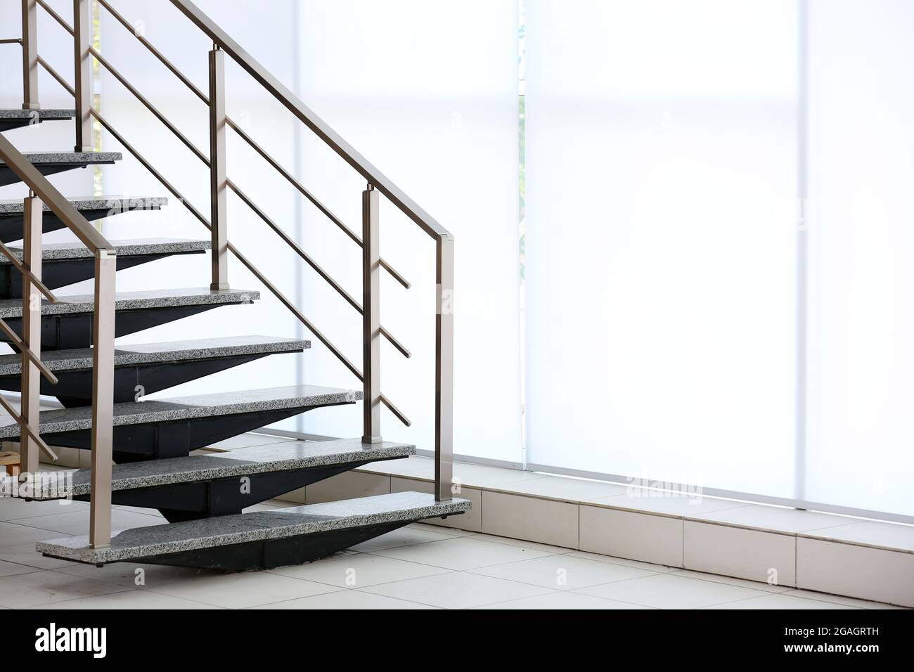 Stairs on big window background Stock Photo - Alamy
