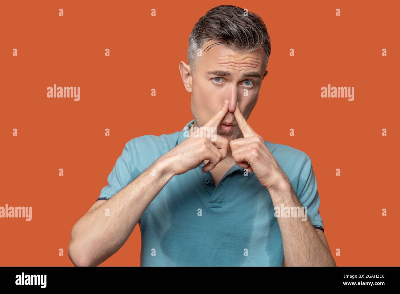 Covering nose hi-res stock photography and images - Alamy