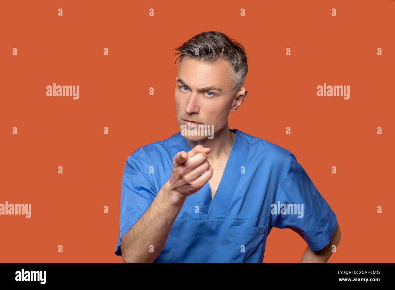 Pointing finger up, orange hi-res stock photography and images - Alamy