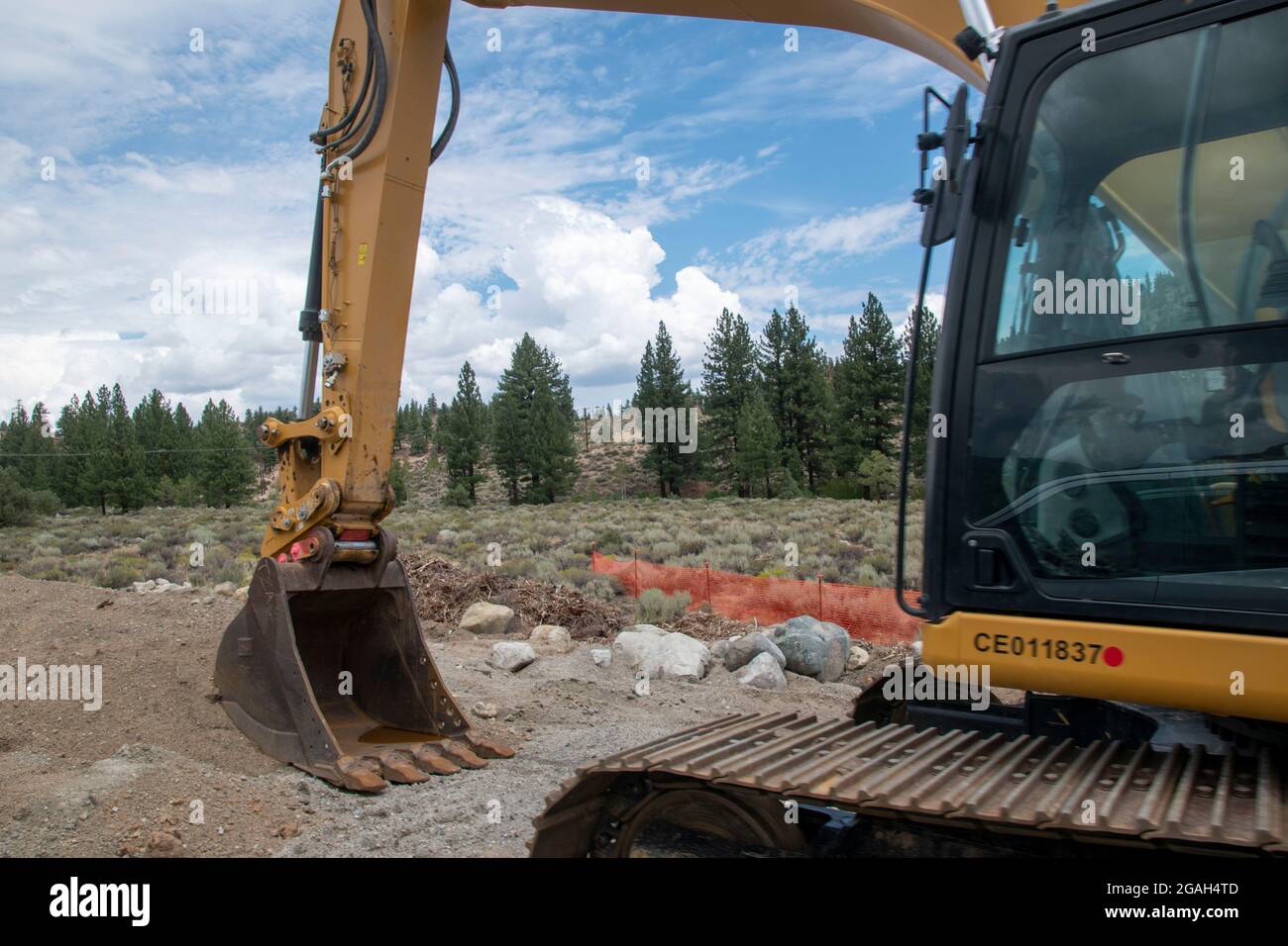 Excavators and bulldozers work on this road project on Sherwin Grade in ...