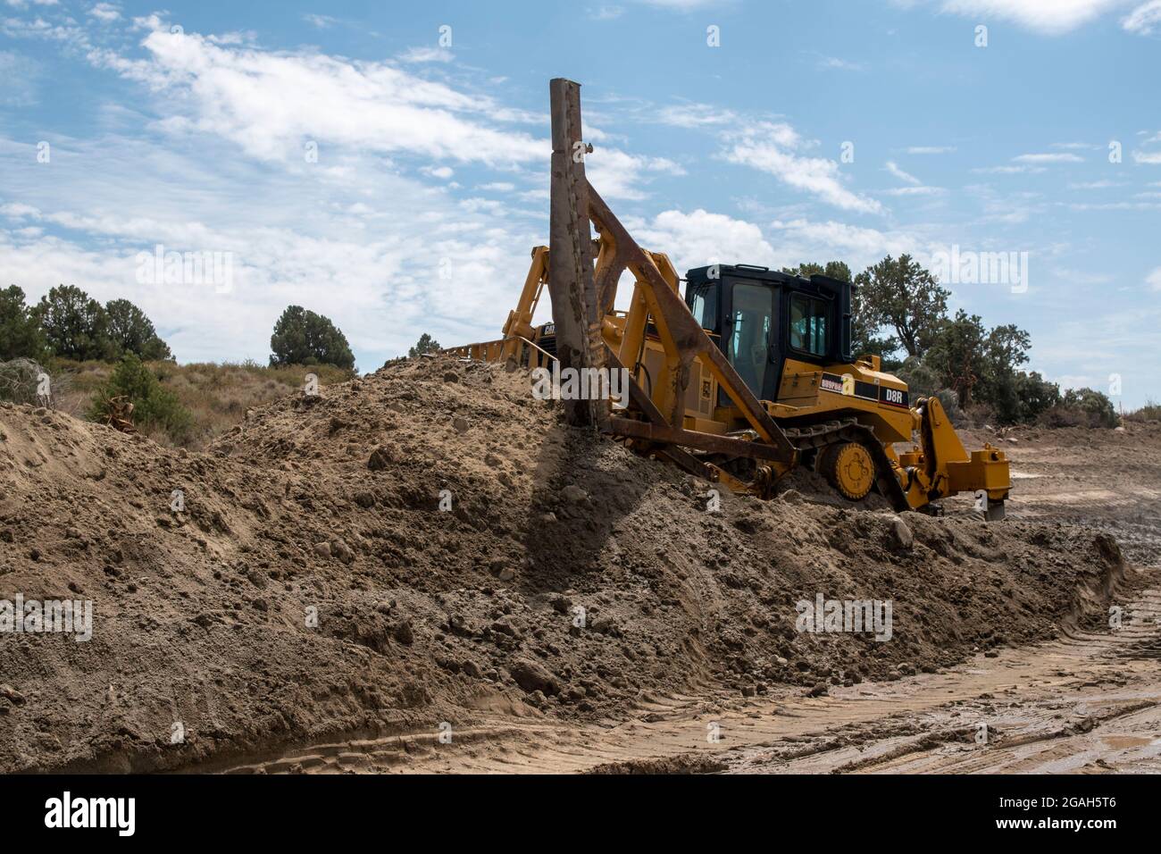 Excavators and bulldozers work on this road project on Sherwin Grade in ...