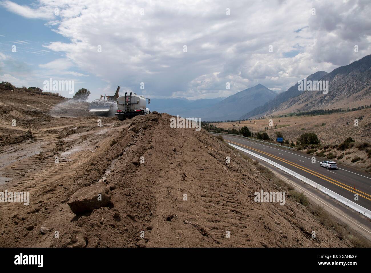 Excavators and bulldozers work on this road project on Sherwin Grade in ...
