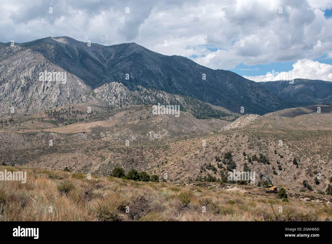 Excavators and bulldozers work on this road project on Sherwin Grade in ...