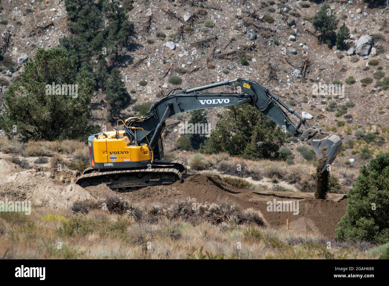Excavators and bulldozers work on this road project on Sherwin Grade in ...
