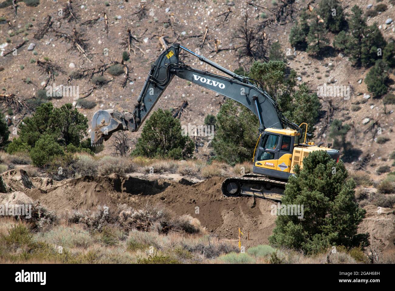 Excavators and bulldozers work on this road project on Sherwin Grade in ...