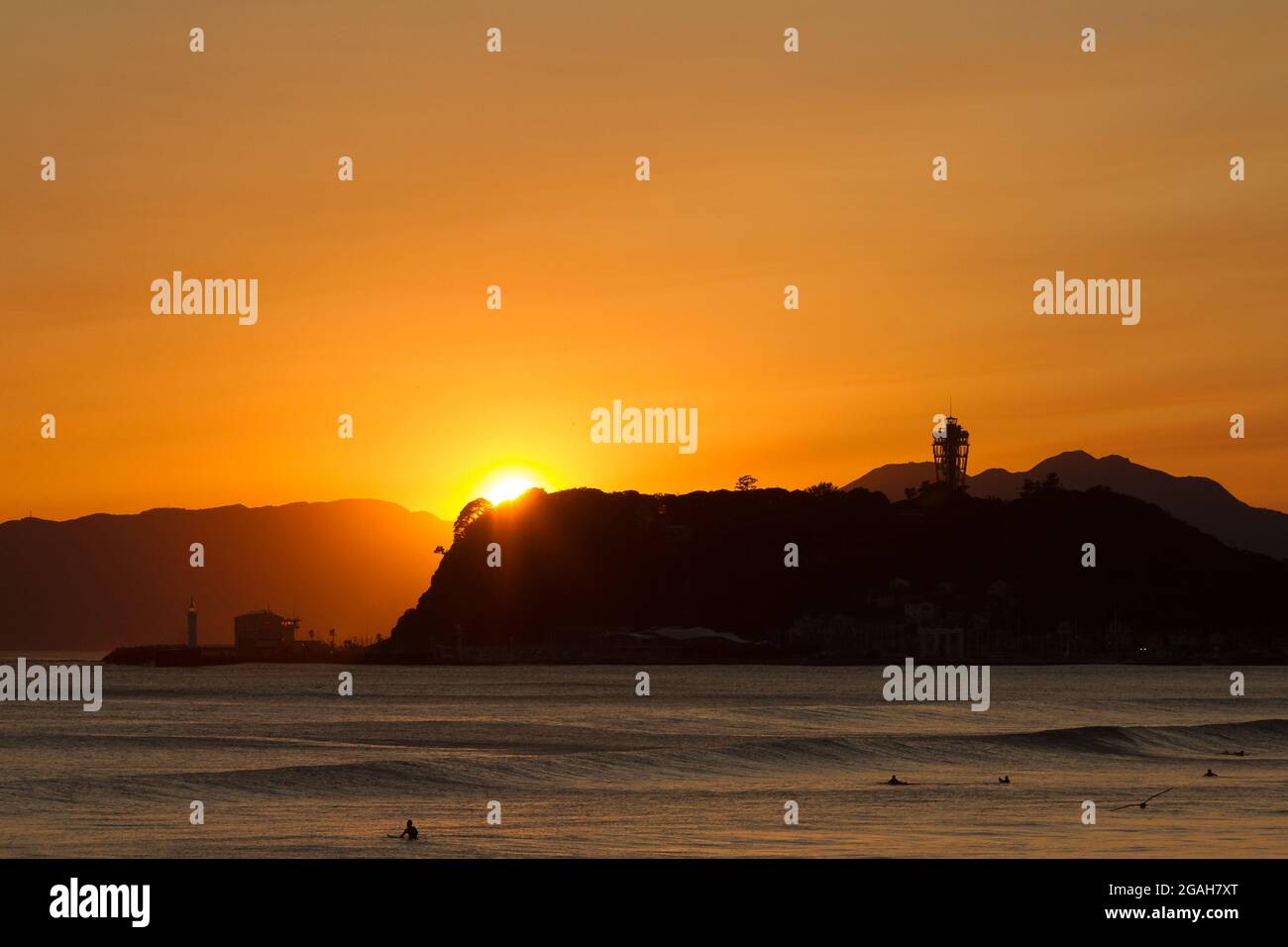 Enoshima island with the Sea Candle lighthouse at sunset, Kanagawa ...