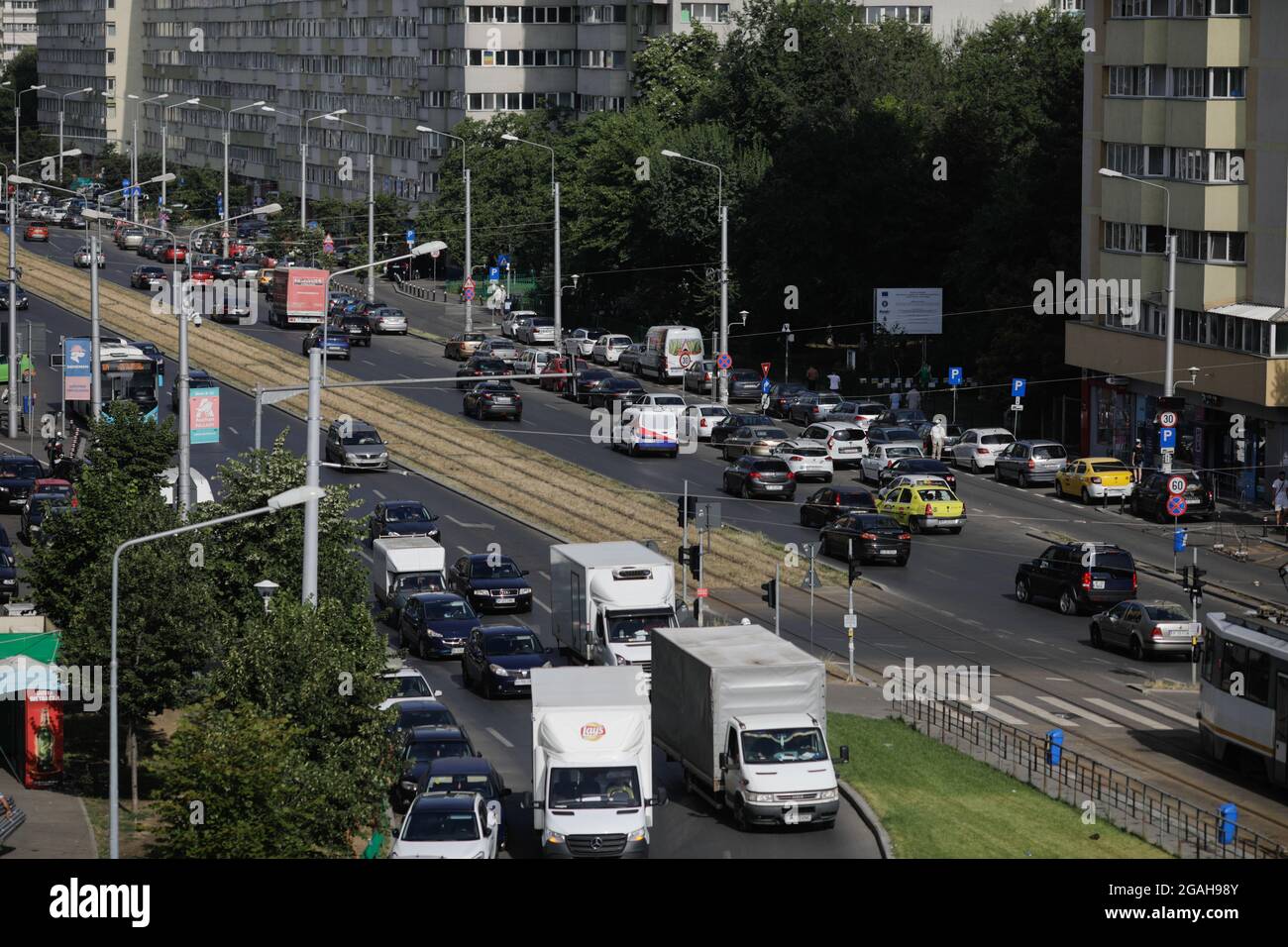 Bucharest, Romania - July 29, 2021: Cars and pedestrians traffic on a ...