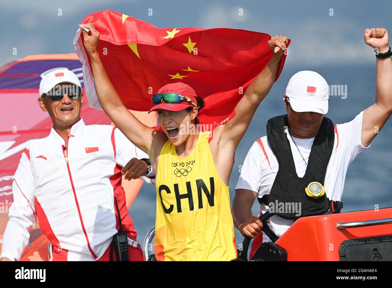 Kanagawa, Japan. 31st July, 2021. Lu Yunxiu (C) of China celebrates ...