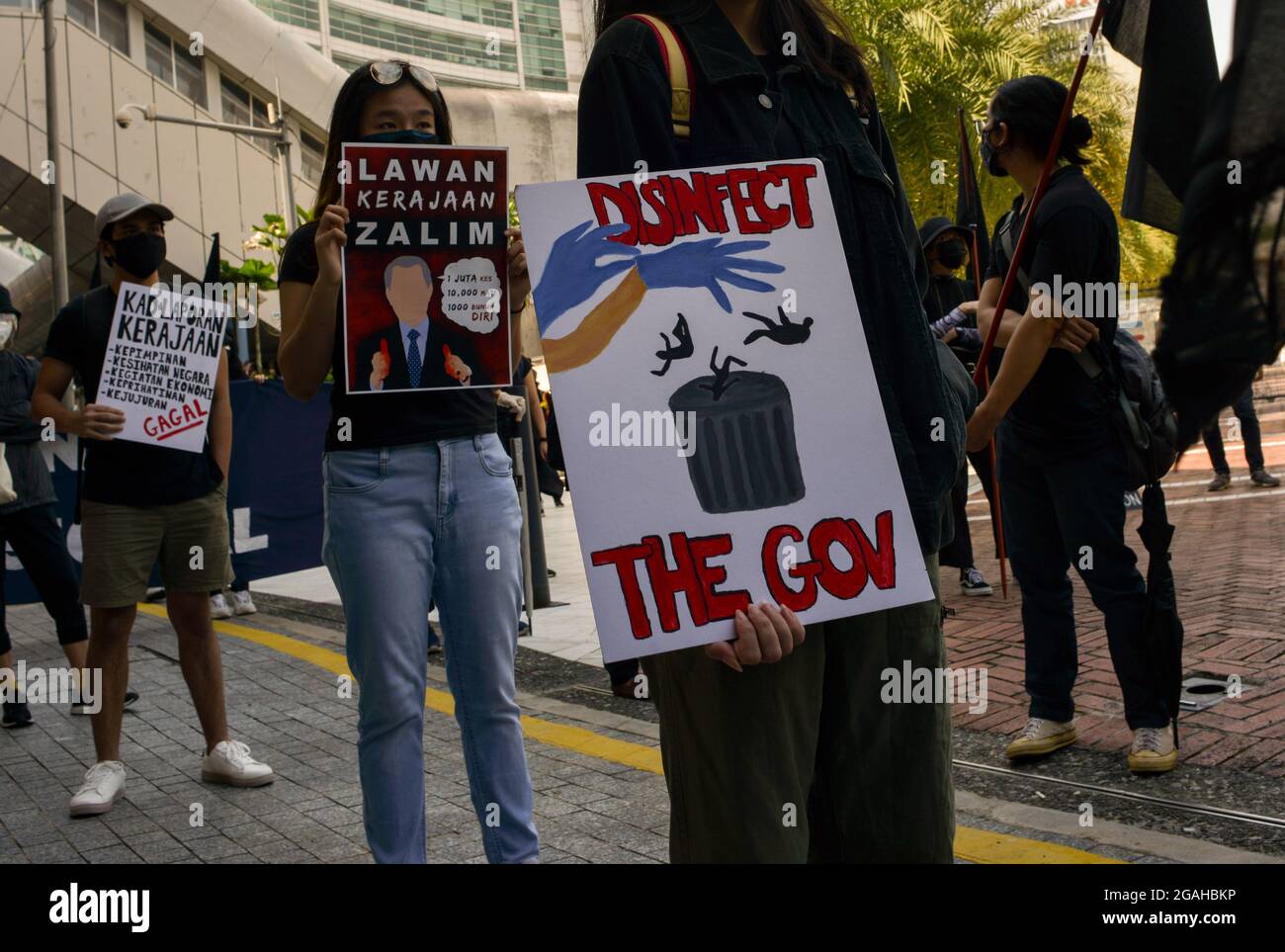 Kuala Lumpur, Kuala Lumpur, Malaysia. 31st July, 2021. Protesters hold ...