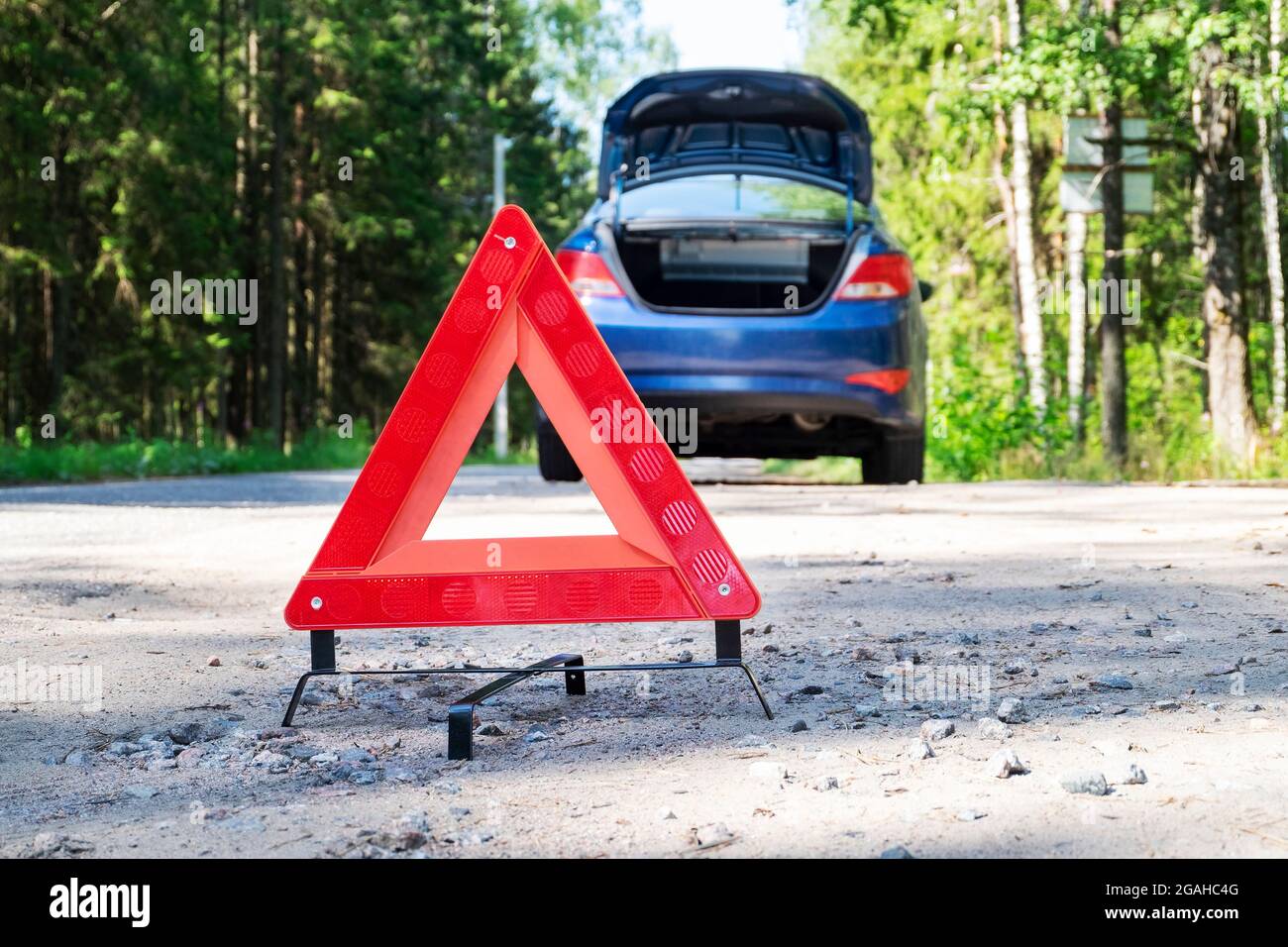 Triangular stop sign hi-res stock photography and images - Alamy