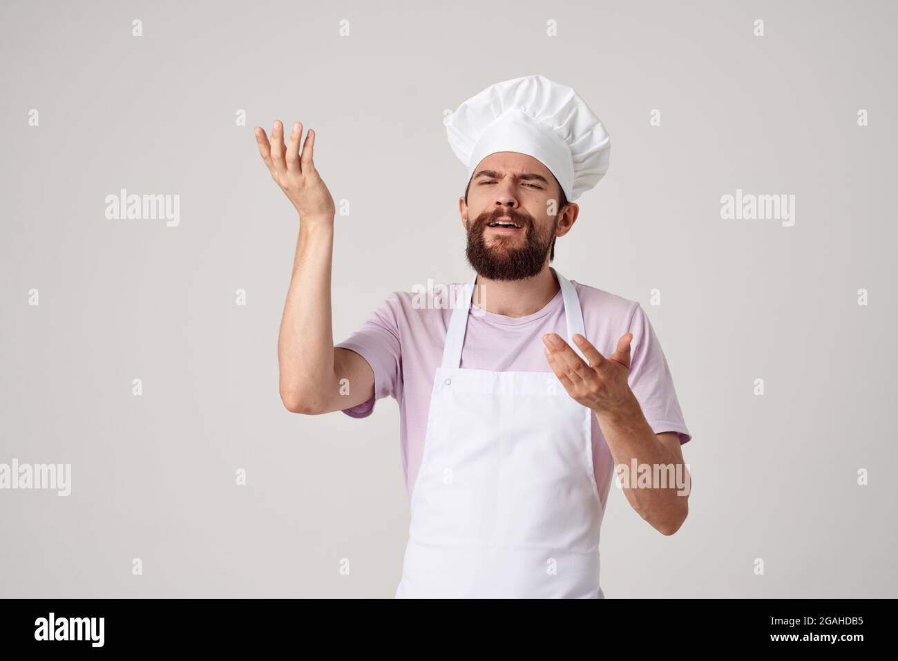 male chef with a hat on his head cooking profession job service Stock ...