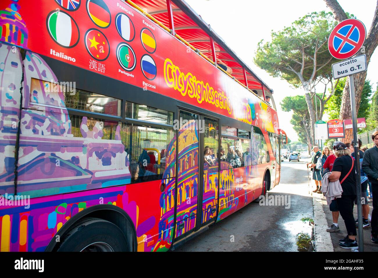 Rome, Italy - October 2019: Tourists waiting to board a Hop On Hop Off ...