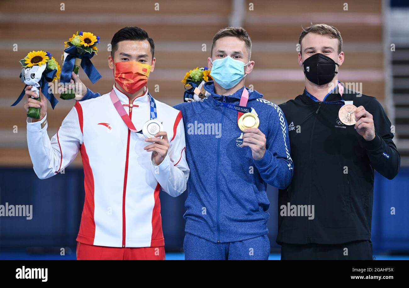 Tokyo, Japan. 31st July, 2021. Dong Dong (L) of China, Ivan Litvinovich ...