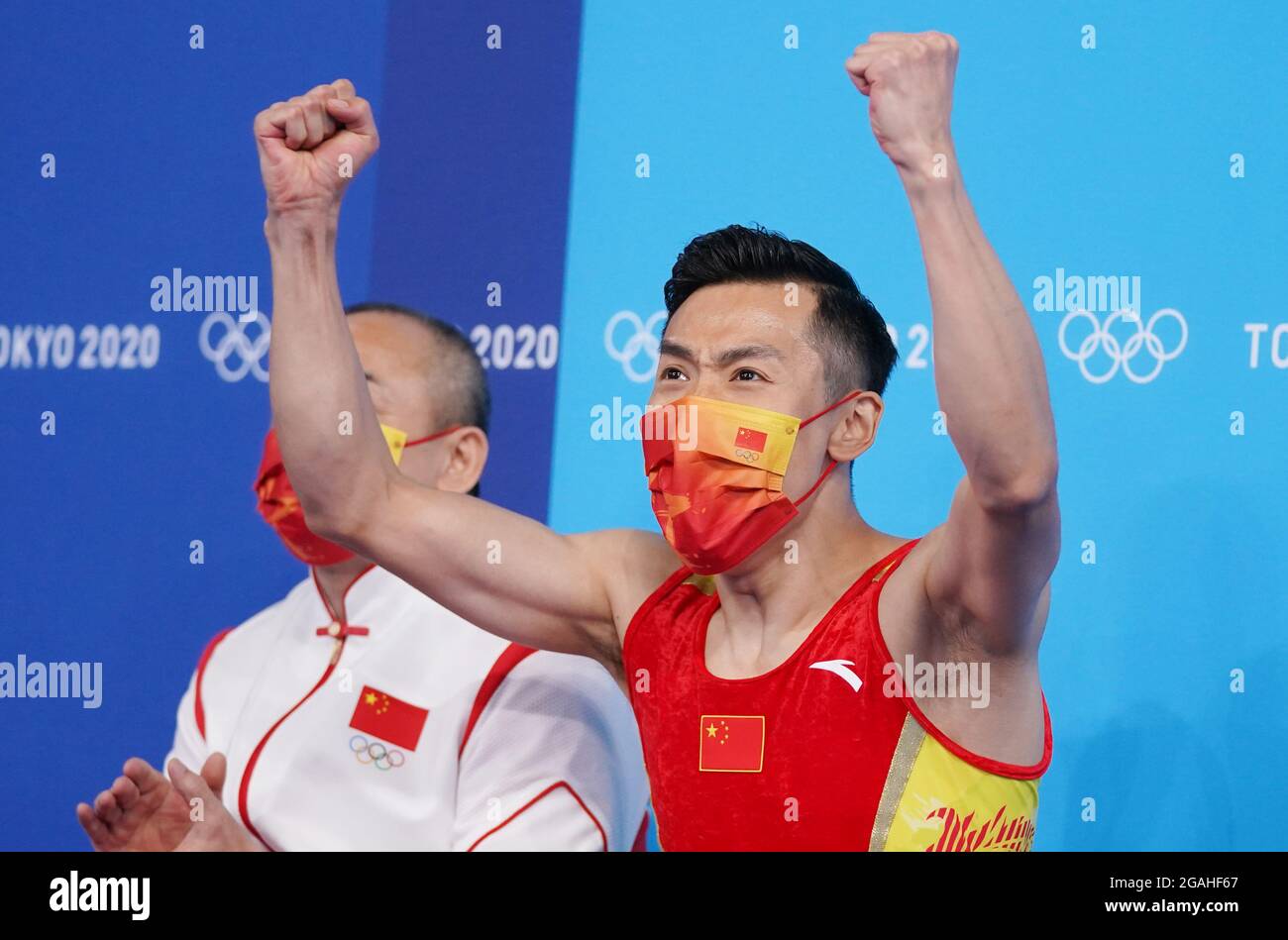 Tokyo, Japan. 31st July, 2021. Dong Dong (R) of China reacts during the ...