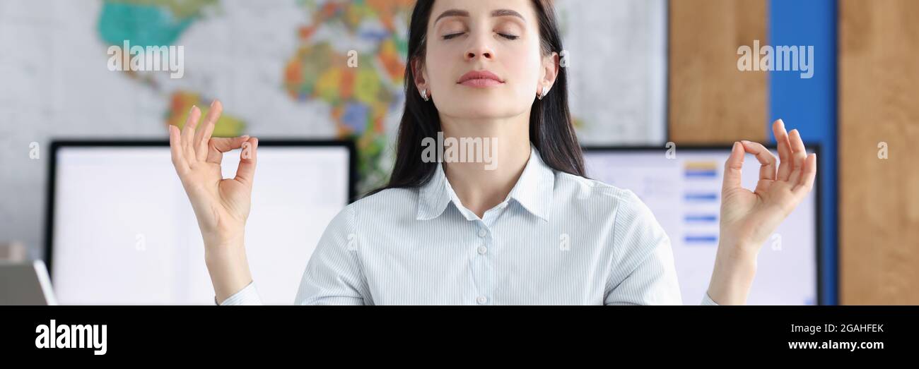 Businesswoman doing relaxation exercises hi-res stock photography and ...