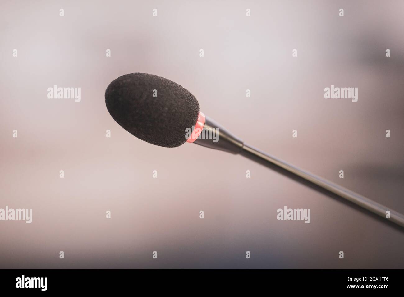 Speaker with mic in conference hi-res stock photography and images - Alamy