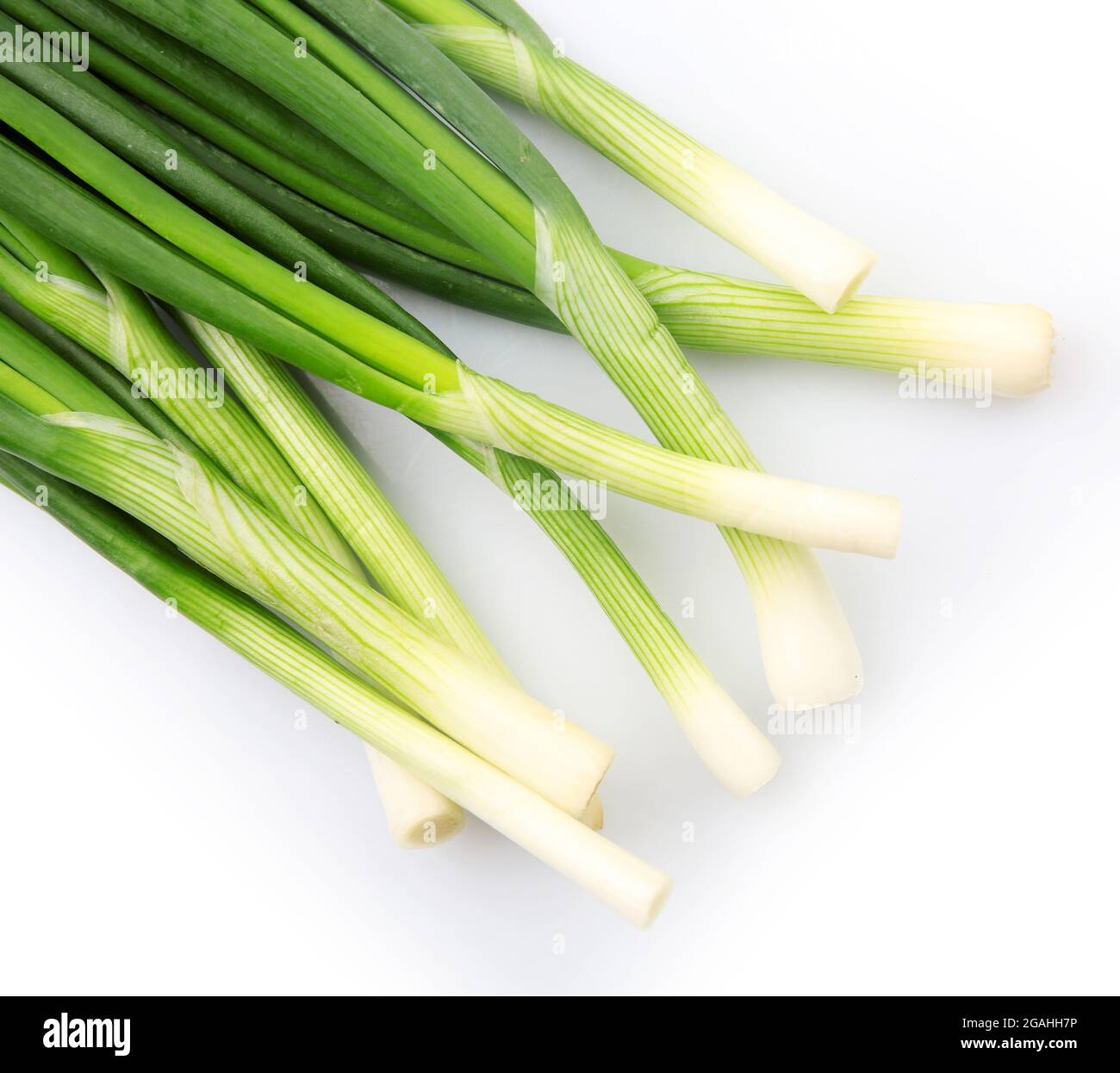 Fresh green onion isolated on white background Stock Photo - Alamy