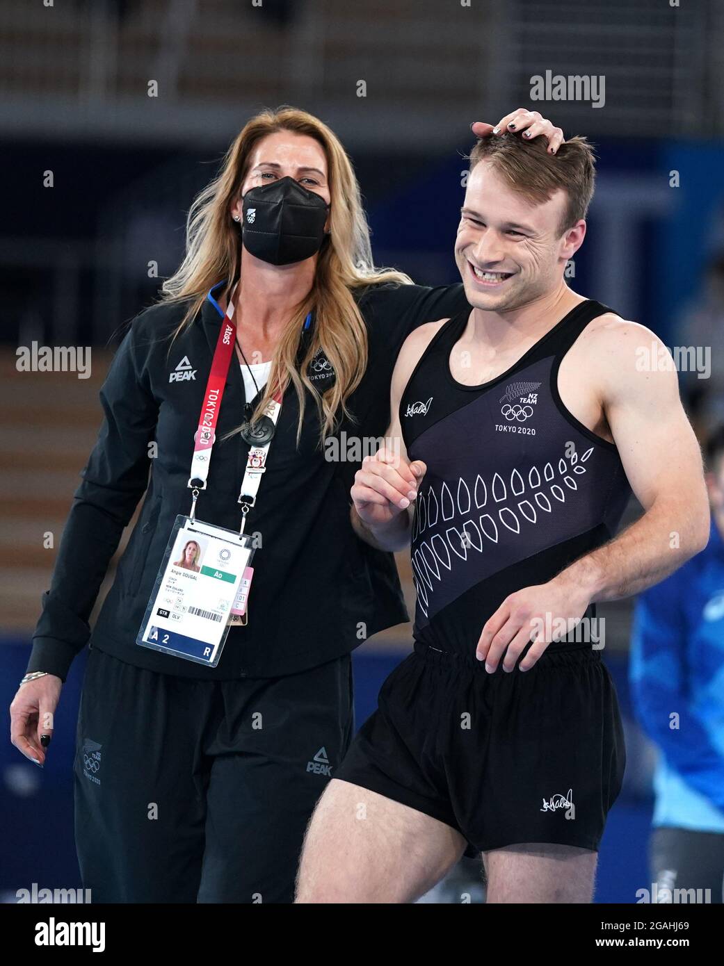 Tokyo, Japan. 31st July, 2021. Dylan Schmidt (R) of New Zealand reacts ...