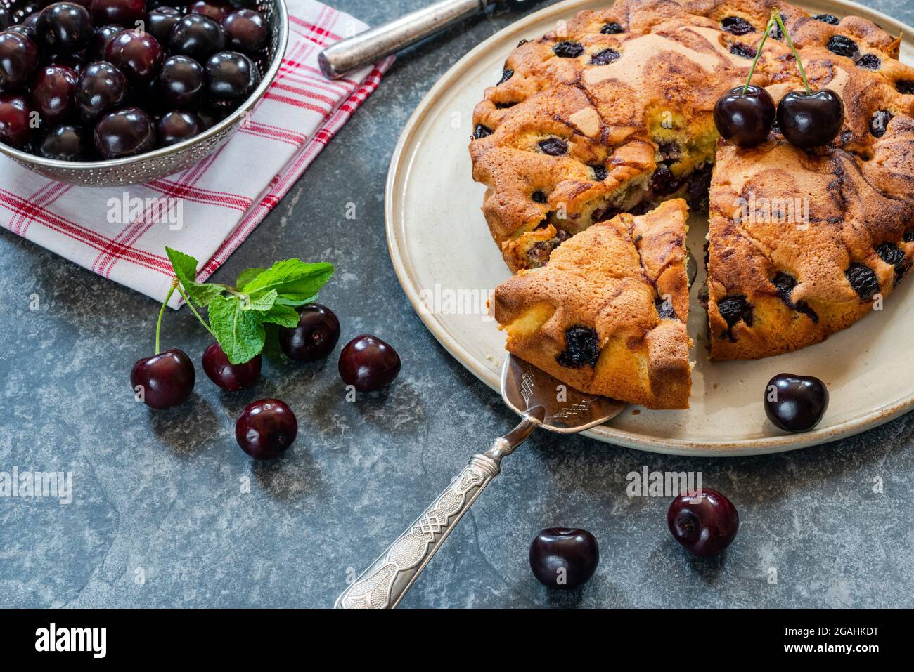 Black cherry sponge cake - high angle view Stock Photo - Alamy