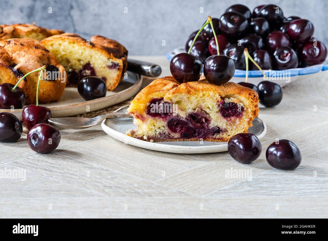 Home baked black cherry sponge cake Stock Photo - Alamy