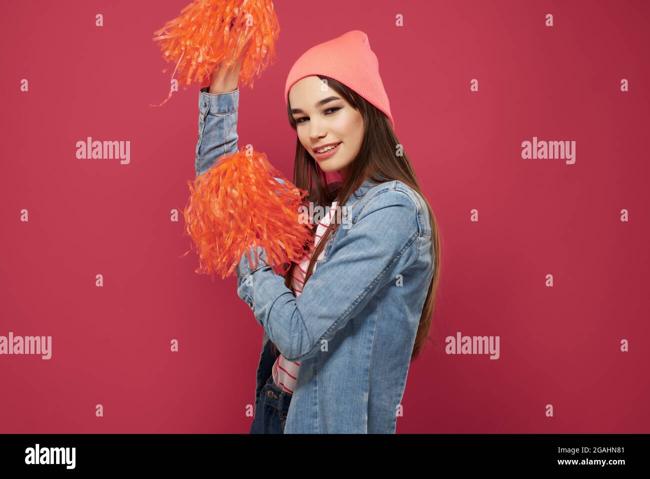 One young woman cheerleader cheerleading hi-res stock photography and ...