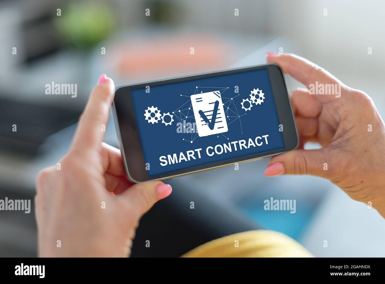 Smartphone screen displaying a smart contract concept Stock Photo - Alamy