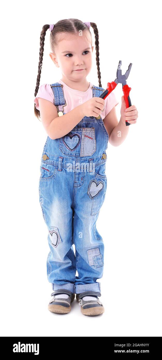 Cute little girl in overall with pliers isolated on white background ...