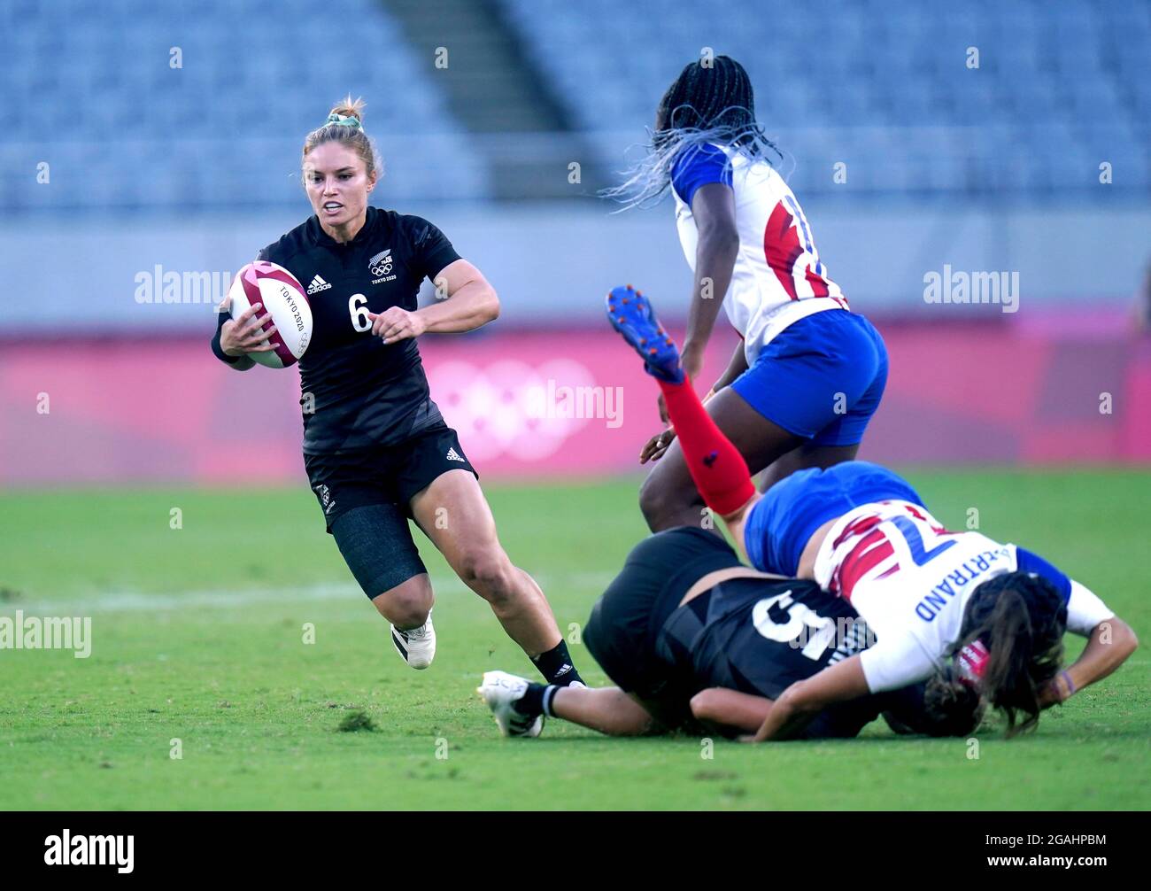 New Zealand's Michaela Blyde breaks free to score her side's first try of the game during the ...