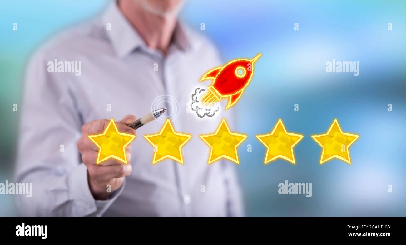 Man touching a quality concept on a touch screen with a pen Stock Photo ...