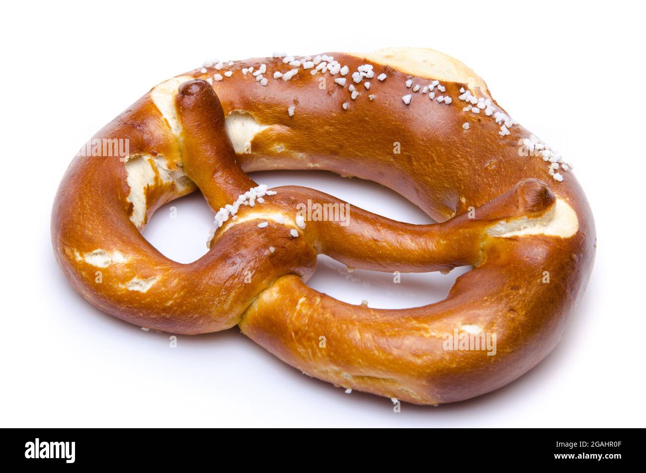 A fresh bretzel, isolated on white Stock Photo - Alamy