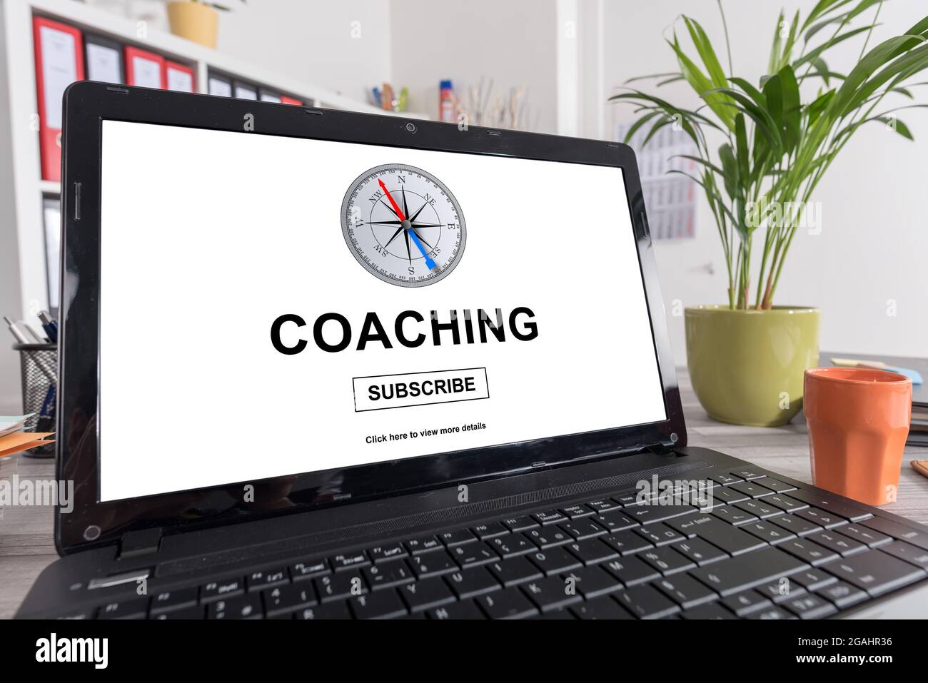 Laptop screen with coaching concept Stock Photo - Alamy