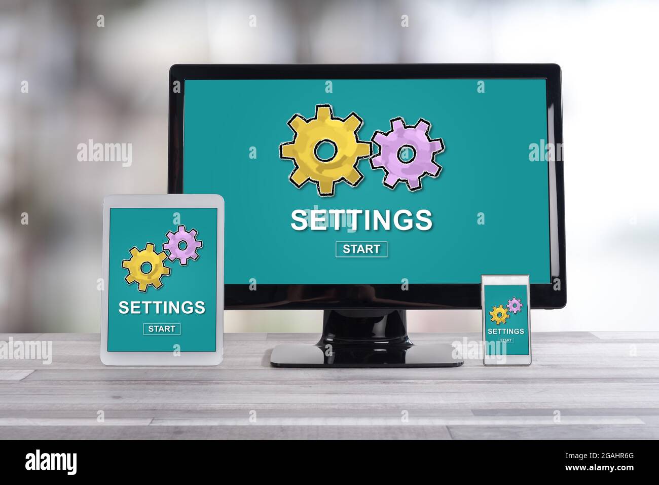 Settings concept shown on different information technology devices ...