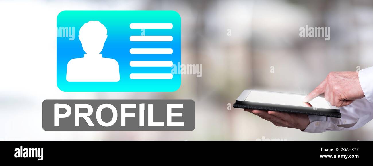 Man using a tablet with profile concept Stock Photo - Alamy