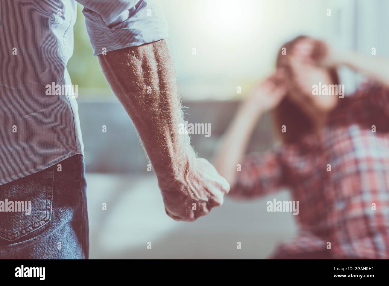 Man about to beat up his wife at home Stock Photo - Alamy