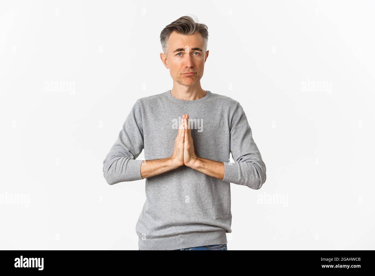 Image of sad middle-aged man begging for help, need something and ...